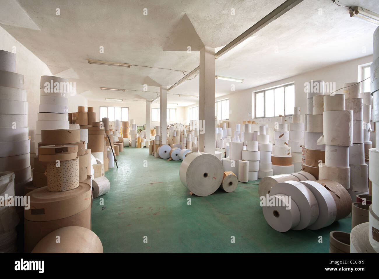 Interior of a warehouse in a printing factory, raw materials in stock ...