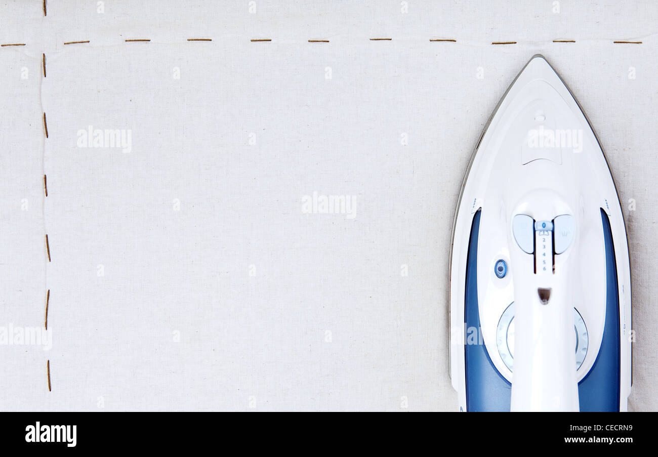Conceptual background - ready for ironing Stock Photo - Alamy