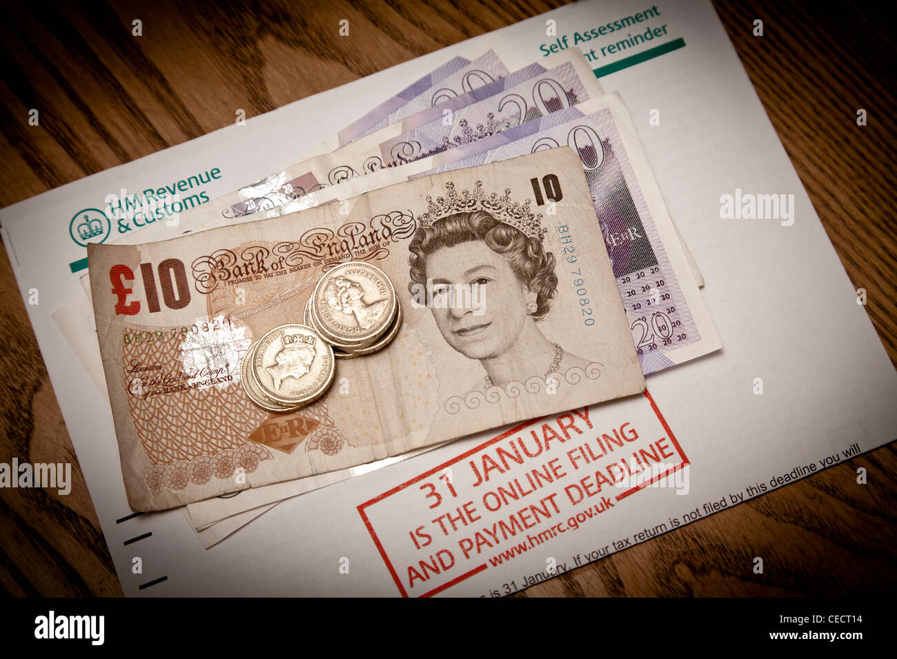 UK tax return reminder and money Stock Photo - Alamy