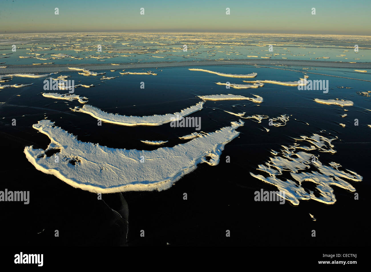 Snow patterns on ice Stock Photo - Alamy