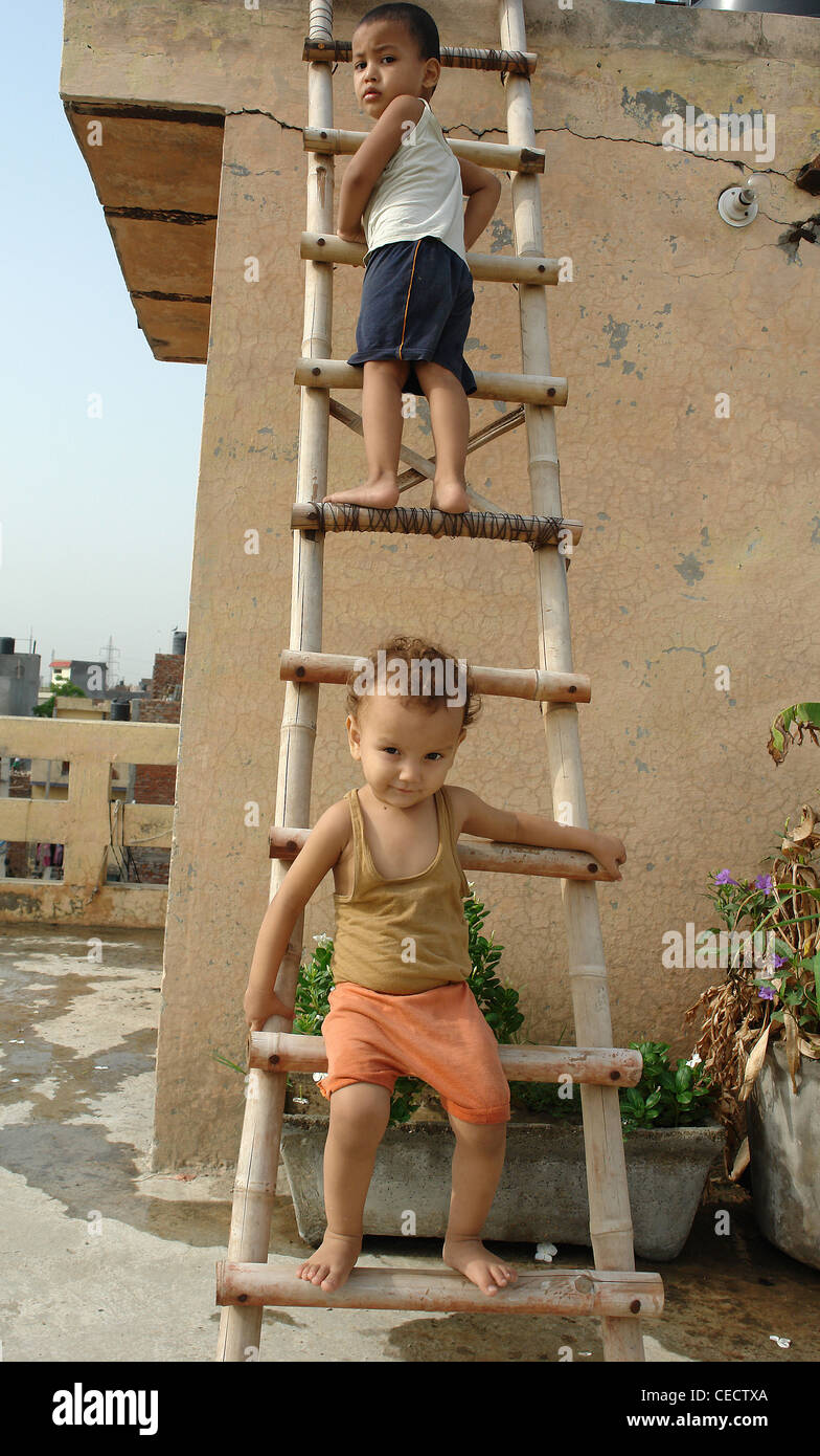 kids climbing on ladder Stock Photo - Alamy