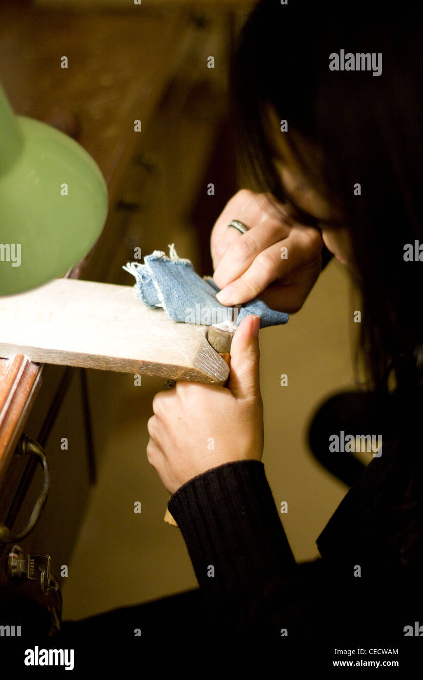 A Skilled worker making a Cameo jewel method of carving an object such ...