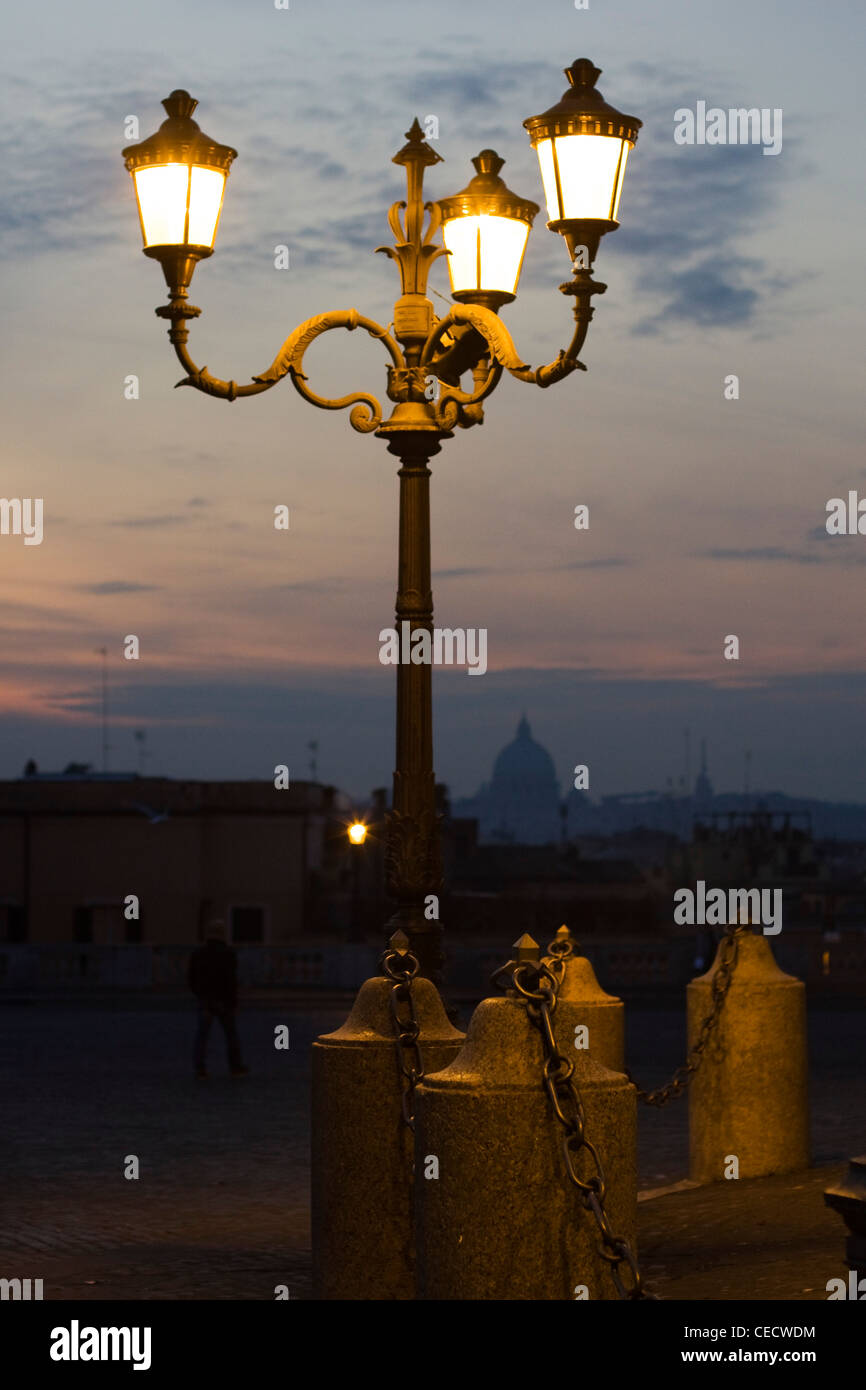 Street lighting at dusk in the city of Rome Italy Stock Photo - Alamy