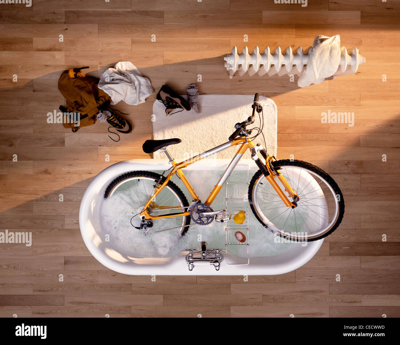 A mountain bike being cleaned in a bath Stock Photo - Alamy