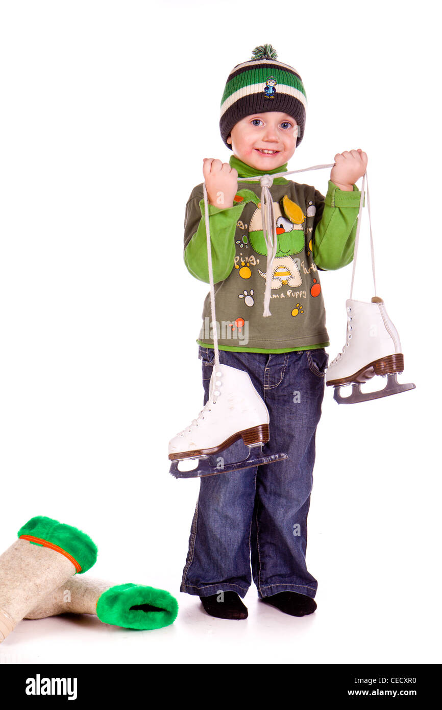 Cute little boy with figure skated isolated over white backgound Stock ...