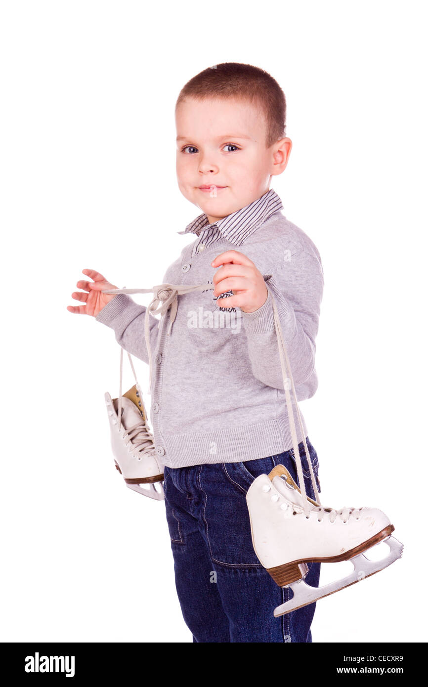 Cute little boy with figure skated isolated over white backgound Stock ...