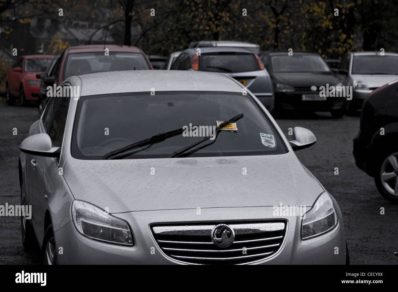 Car parking fine ticket on car windscreen of parked silver car Stock ...