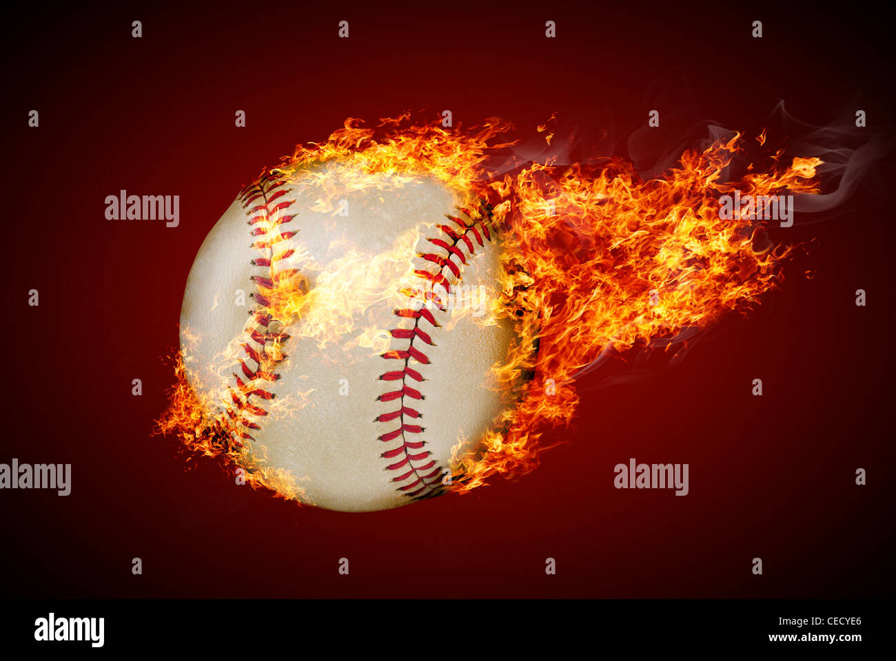 Flying baseball ball on fire Stock Photo - Alamy