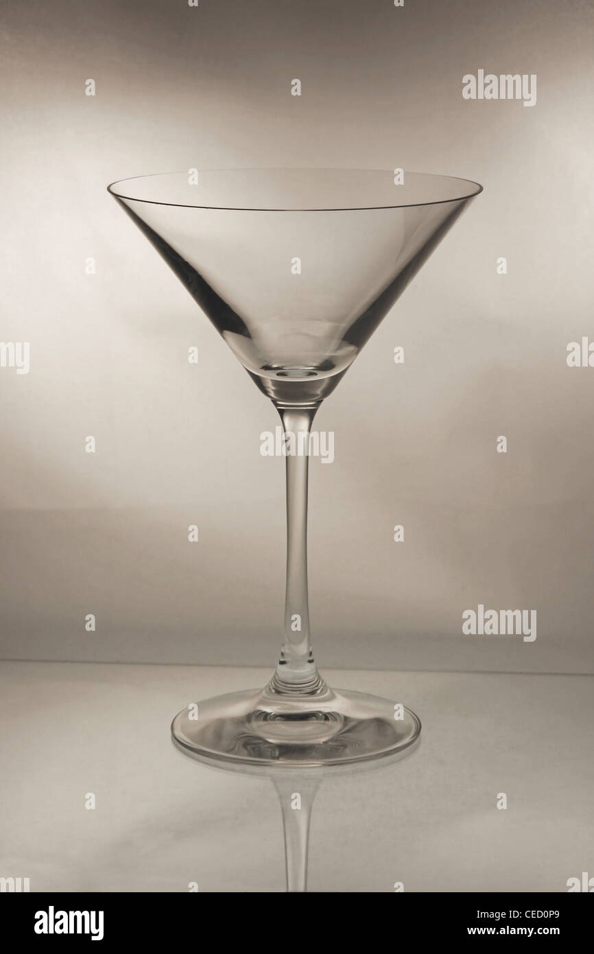 Empty cocktail glass with an artistically backlight Stock Photo - Alamy
