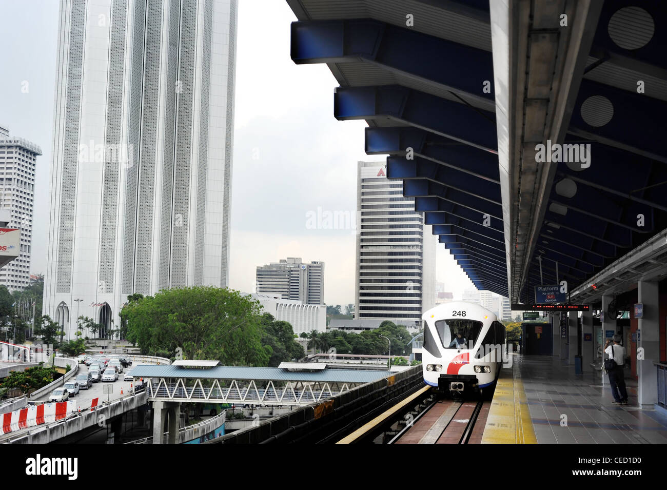 LRT train arrives at a train station in Kuala Lumpur, Malaysia Stock ...