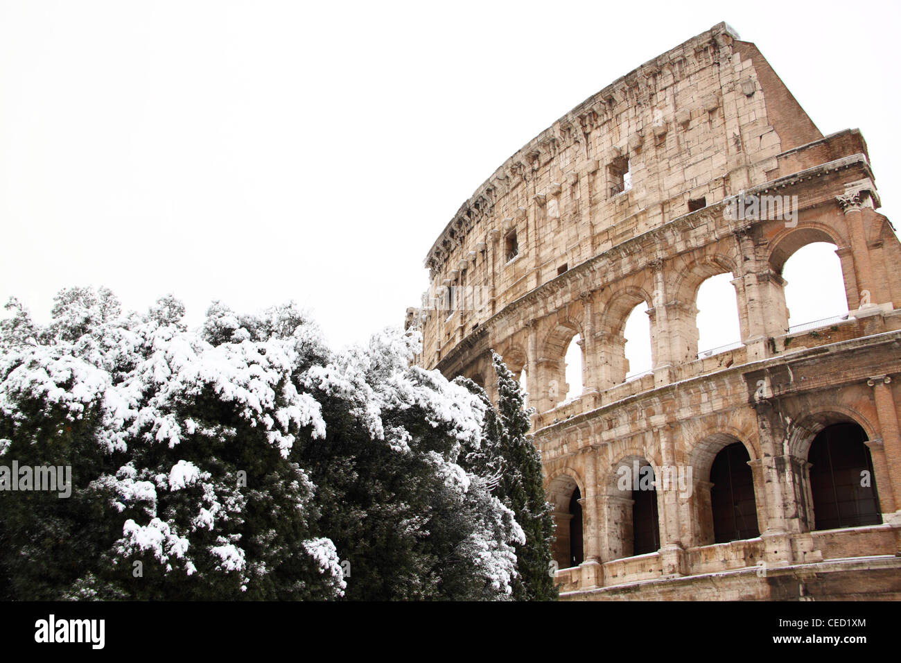 The Coliseum covered by snow, a really rare event in Rome Stock Photo ...