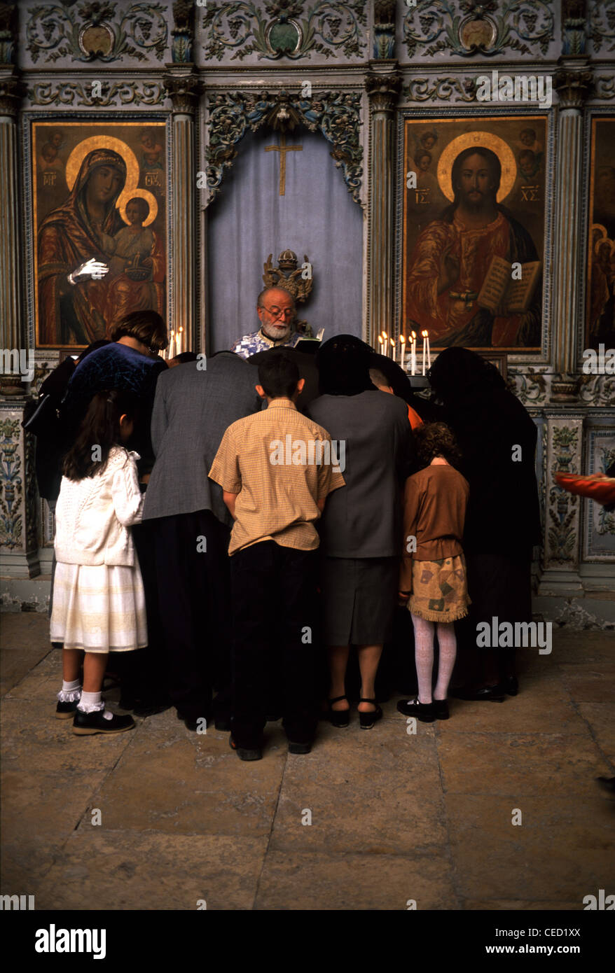 Arab Orthodox Christians praying at the Chapel of St John and baptistry ...
