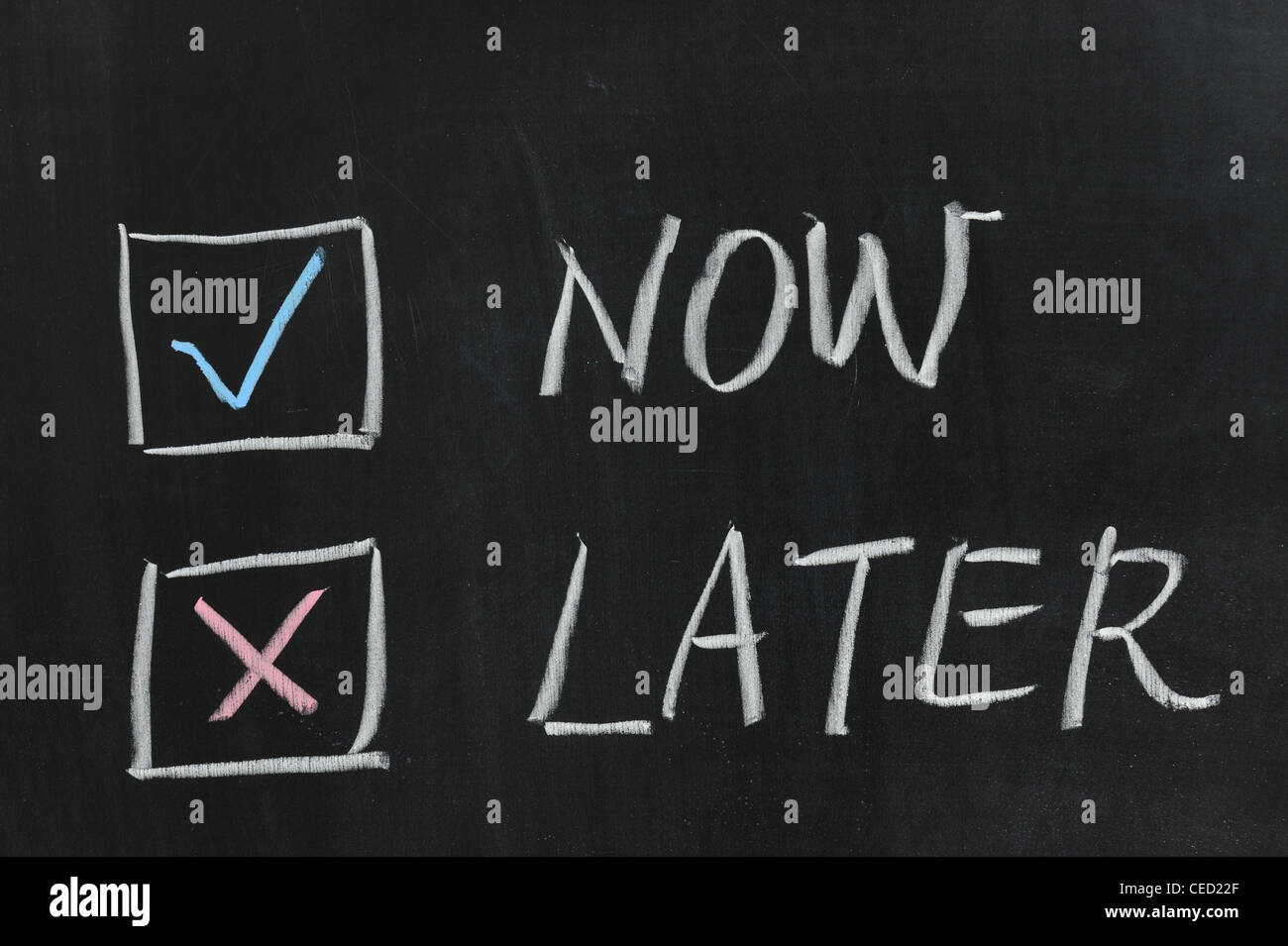 Chalkboard drawing - choose from now or later Stock Photo - Alamy