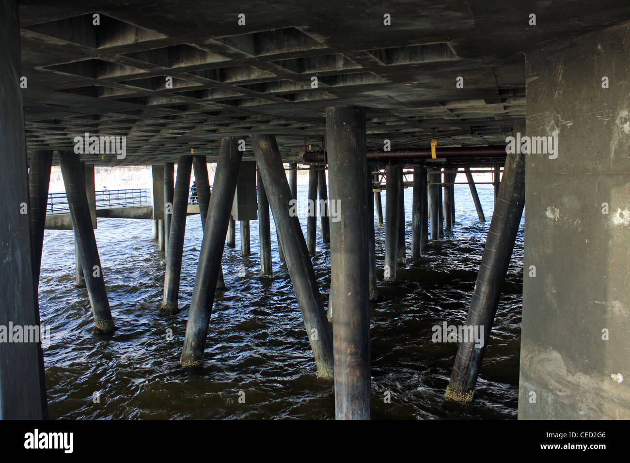 A shot of a pier taken from under the pier Stock Photo - Alamy