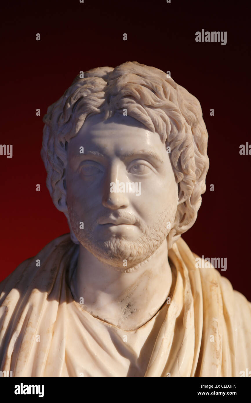 Marble statue of Roman man wearing toga Stock Photo - Alamy