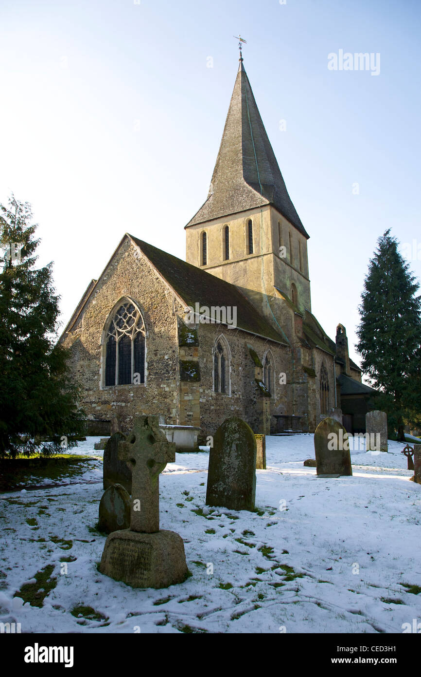 St James Church, Shere, Surrey on the banks of the River Tillingbourne ...