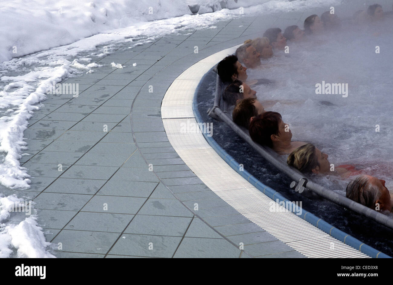 People bath in the medicinal hot water spring pool of Walliser ...