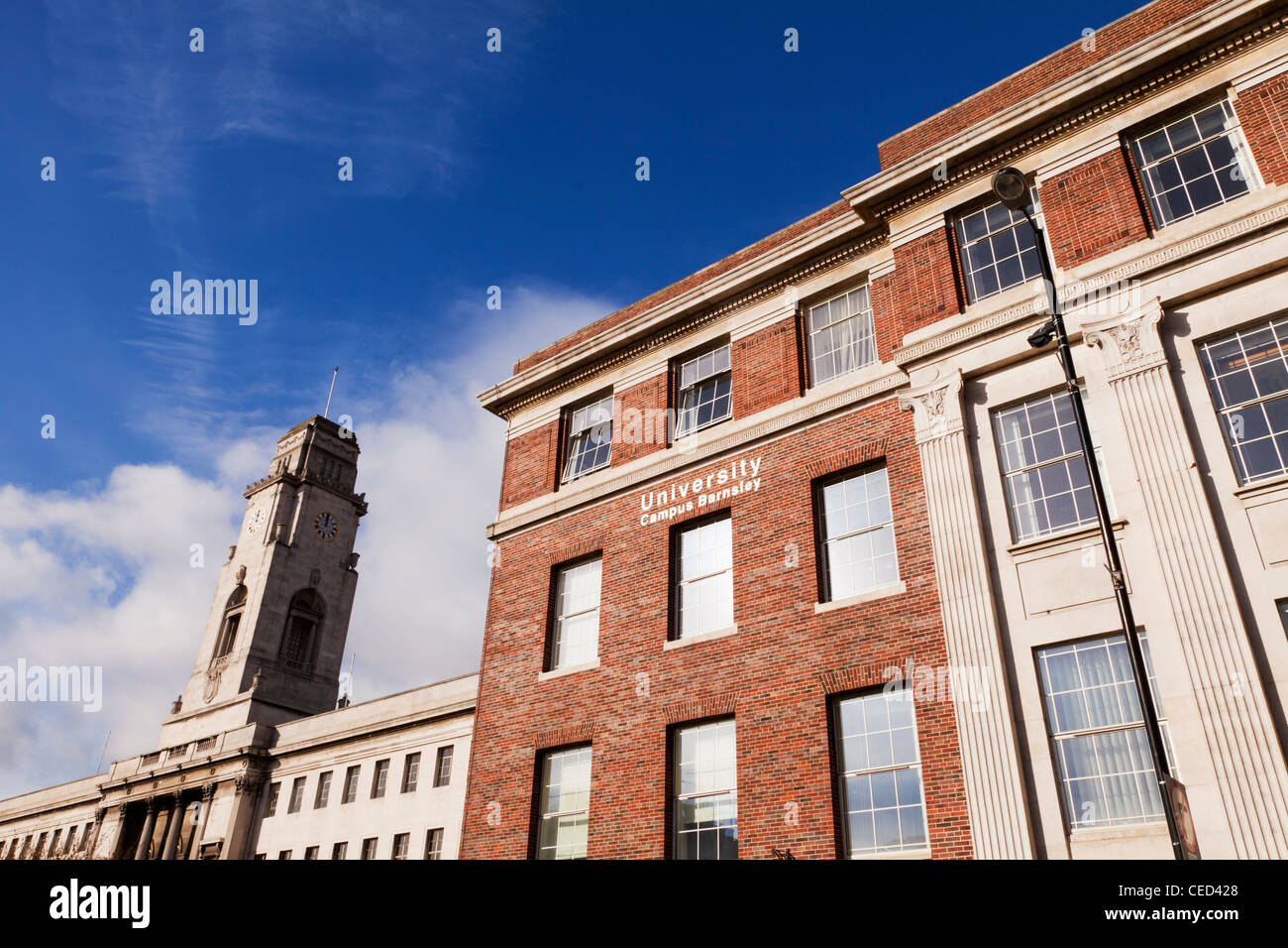 The campus of Barnsley University with the Town Hall in the background ...