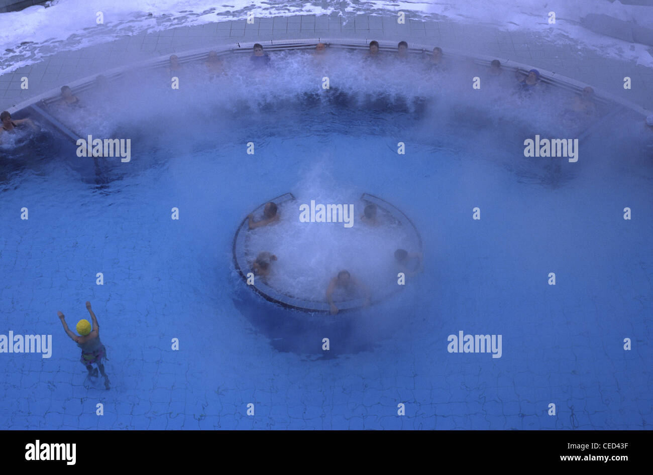 People bath in the medicinal hot water spring pool of Walliser ...
