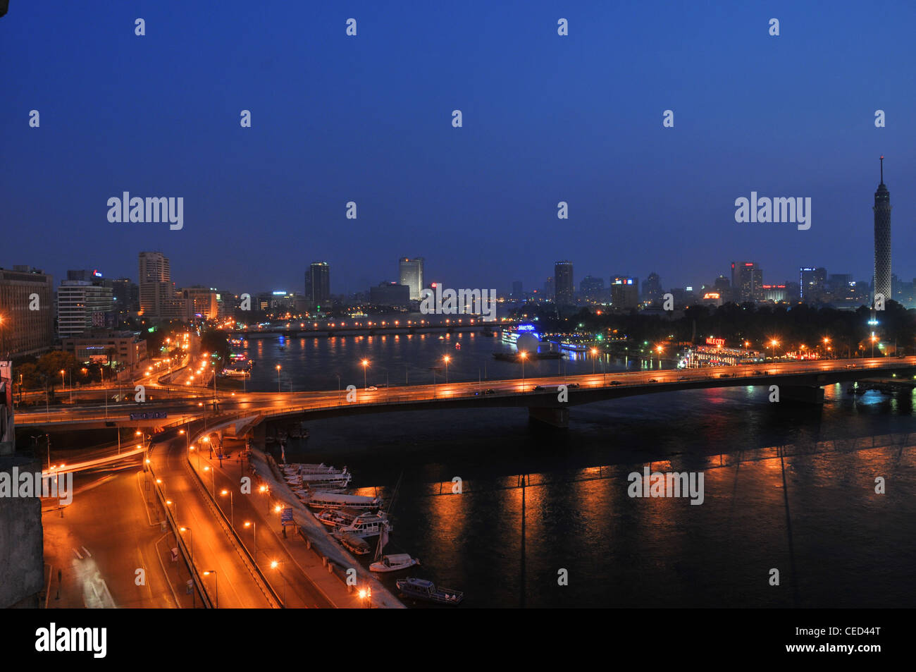 A central Cairo panorama looking west across the Nile River at dusk ...