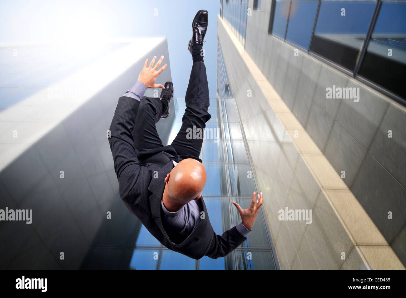 Businessman falling from building hi-res stock photography and images ...