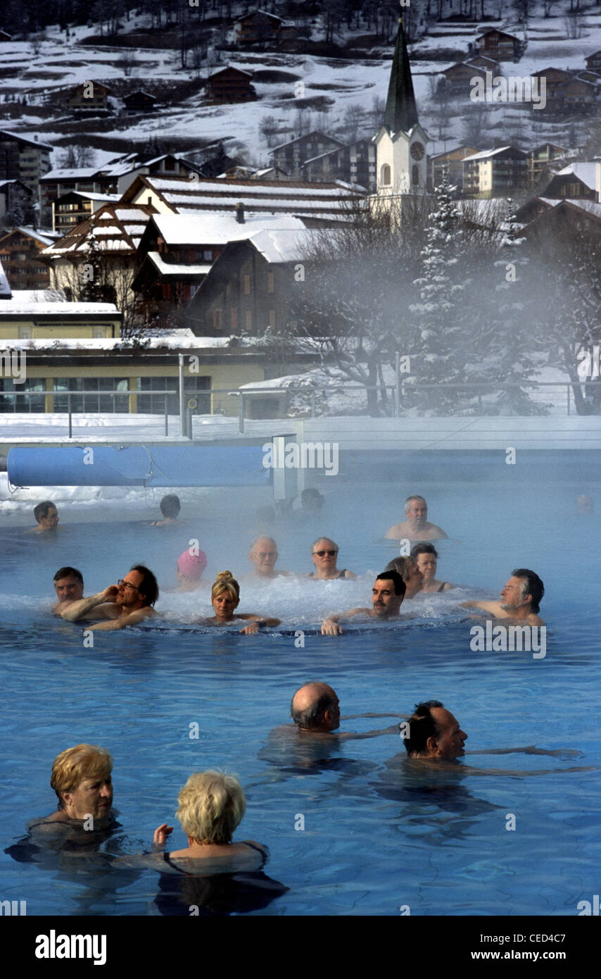 People bath in the medicinal hot water spring pool of Walliser ...
