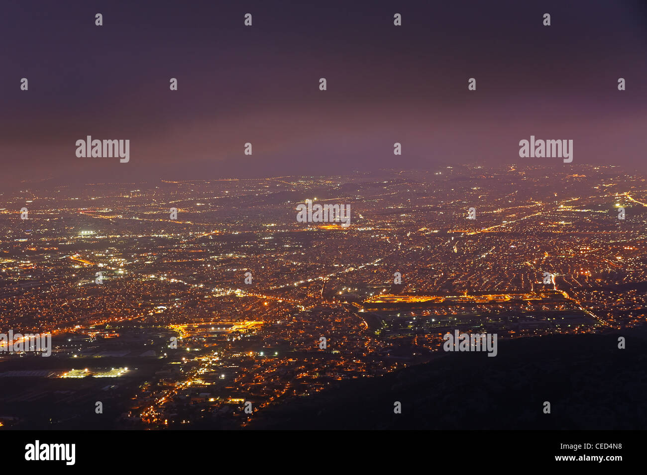Athens skyline aerial view in the afternoon with the lights over blue ...