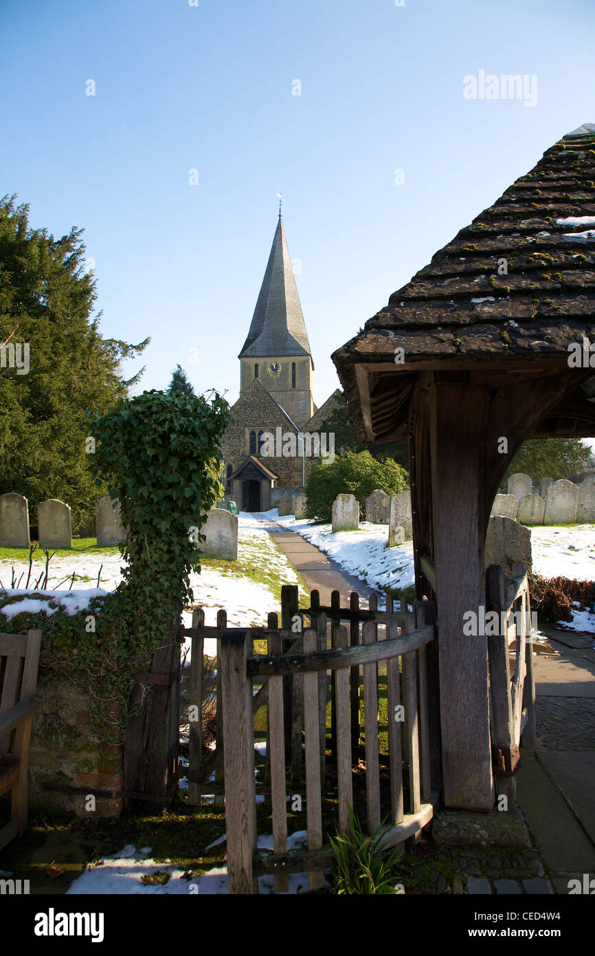 St James Church, Shere, Surrey on the banks of the River Tillingbourne ...