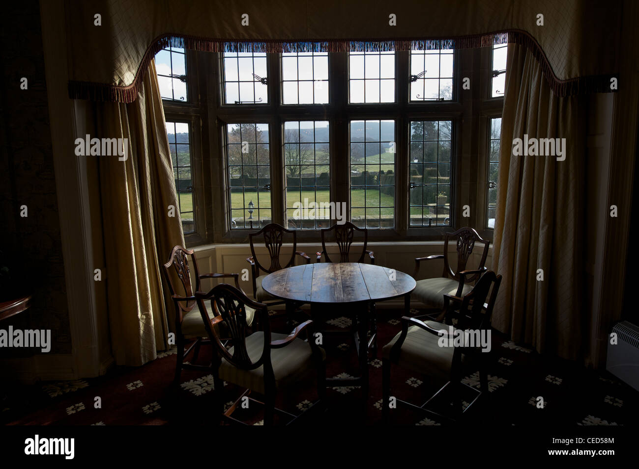 Large stone and lead bay window Stock Photo - Alamy