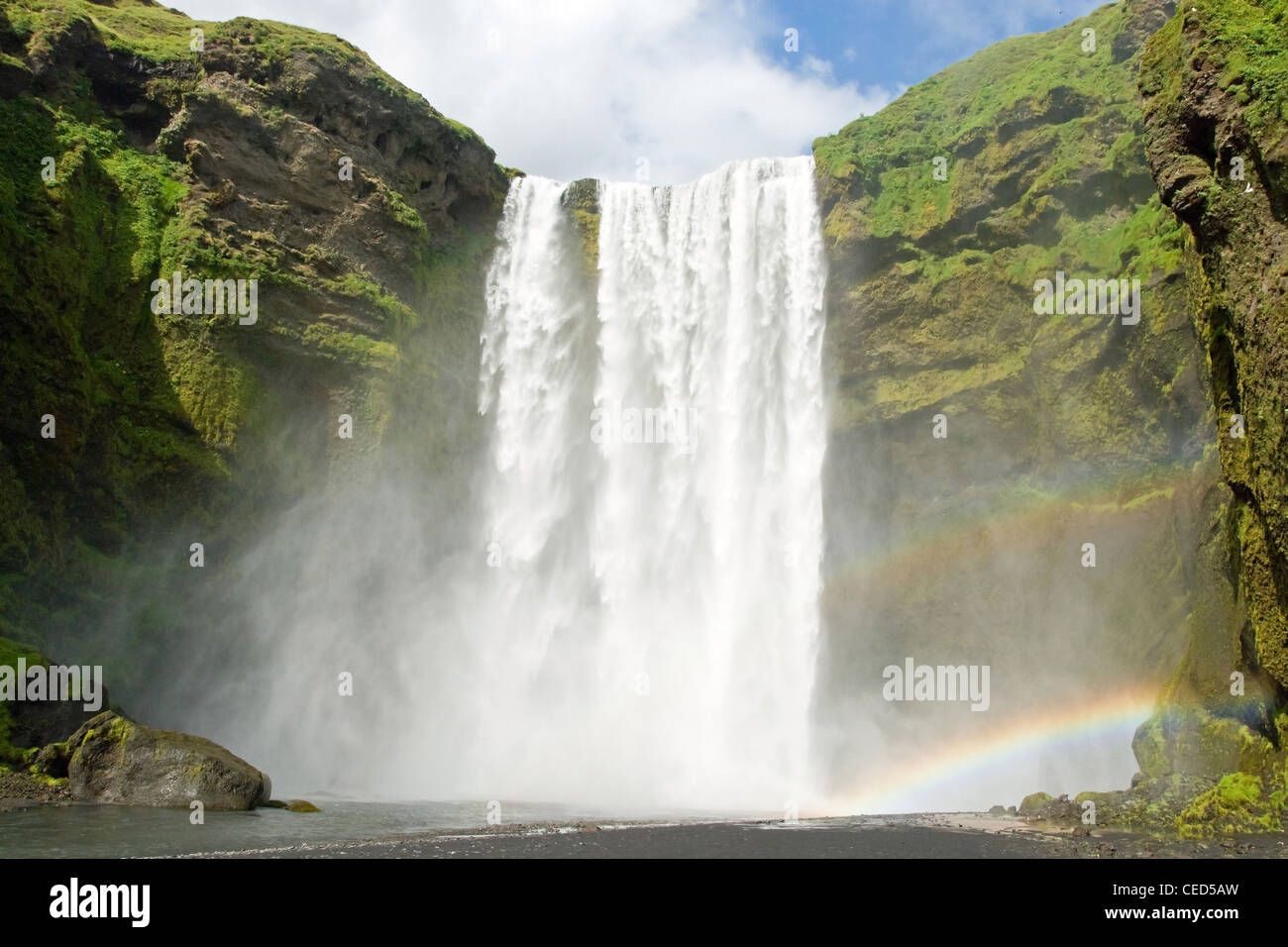 Skogarfoss fall on the Iceland with a rainbow Stock Photo - Alamy