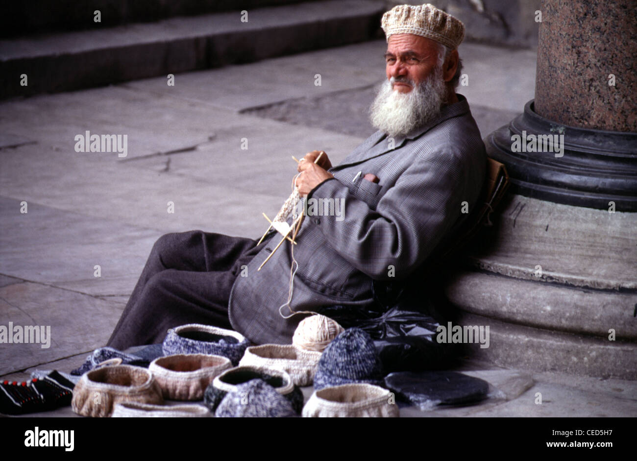 Elderly man weaving traditional wool Fez hats in Sultanahmet district ...