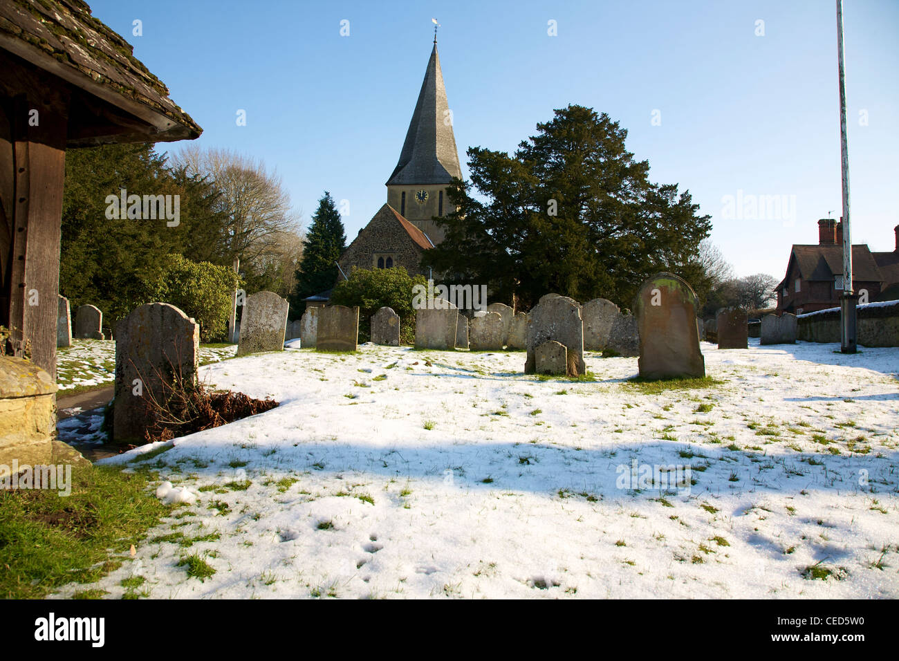 St James Church, Shere, Surrey on the banks of the River Tillingbourne ...