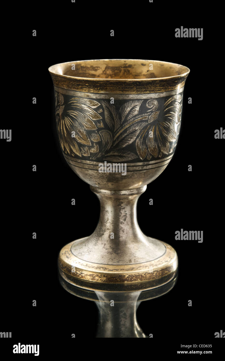 Ancient winecup on black background Stock Photo - Alamy
