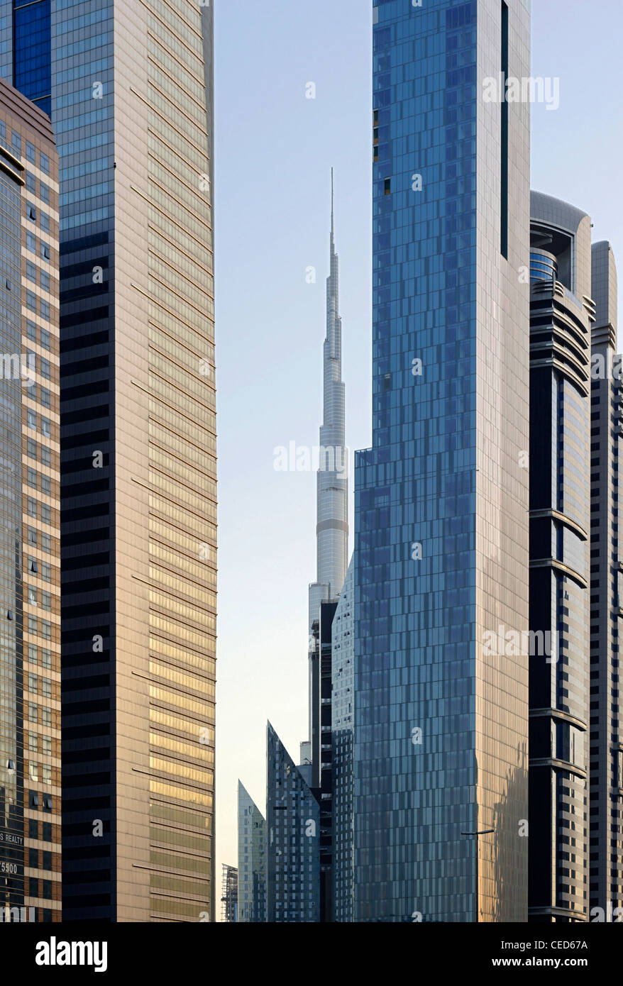 Towers, skyscrapers on Sheikh Zayed Road, in the back the Burj Khalifa ...