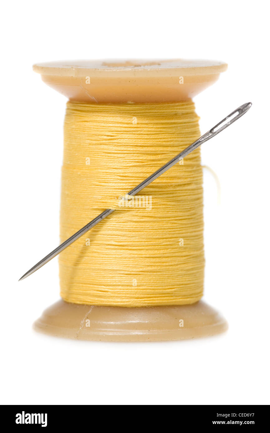 Sewing tools - needle and strings. Isolated on white background Stock ...