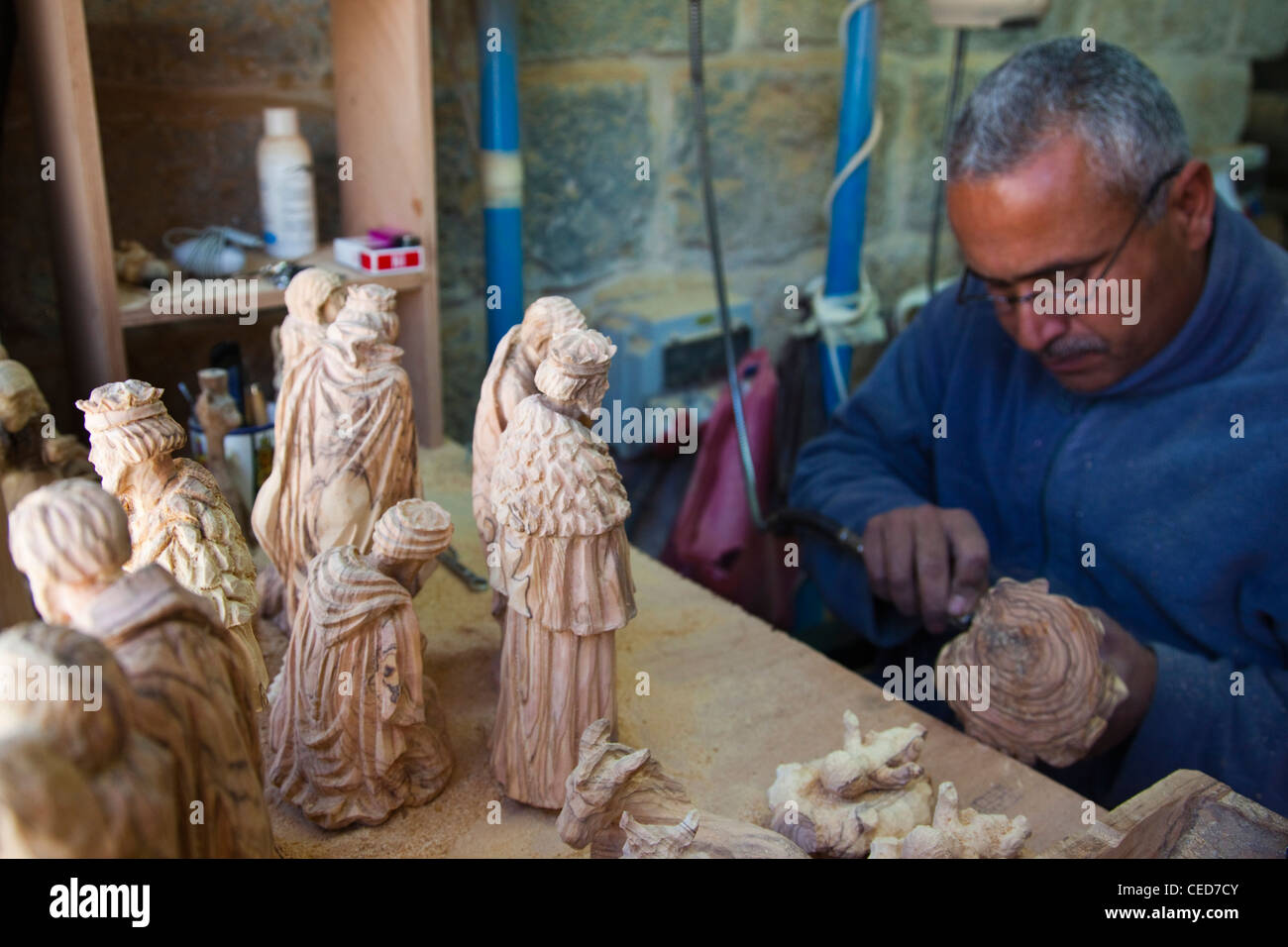 Israel, West Bank, Bethlehem, Arab Christian artisan making wooden ...