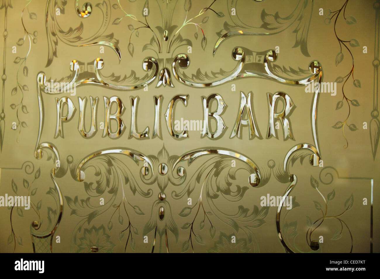 ornate old entrance wooden timber front door to a private public bar ...