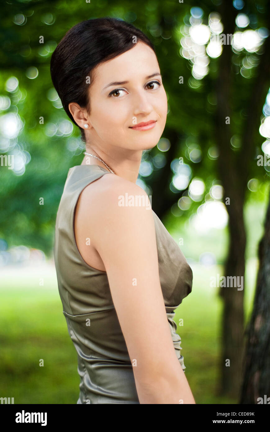 Portrait of elegant and graceful model made in park Stock Photo - Alamy