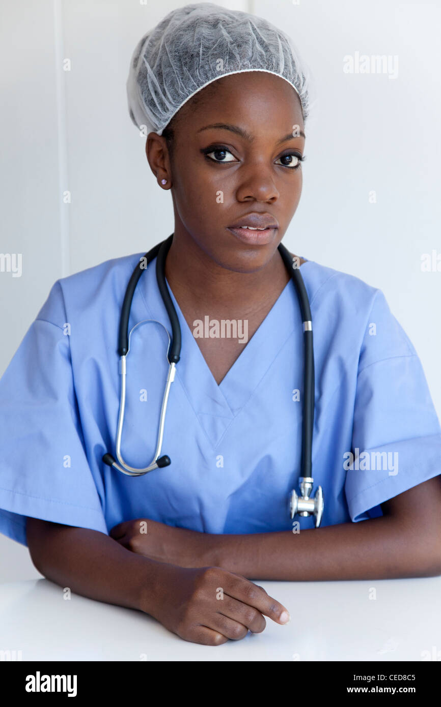 Black doctor in scrubs and surgical cap Stock Photo - Alamy