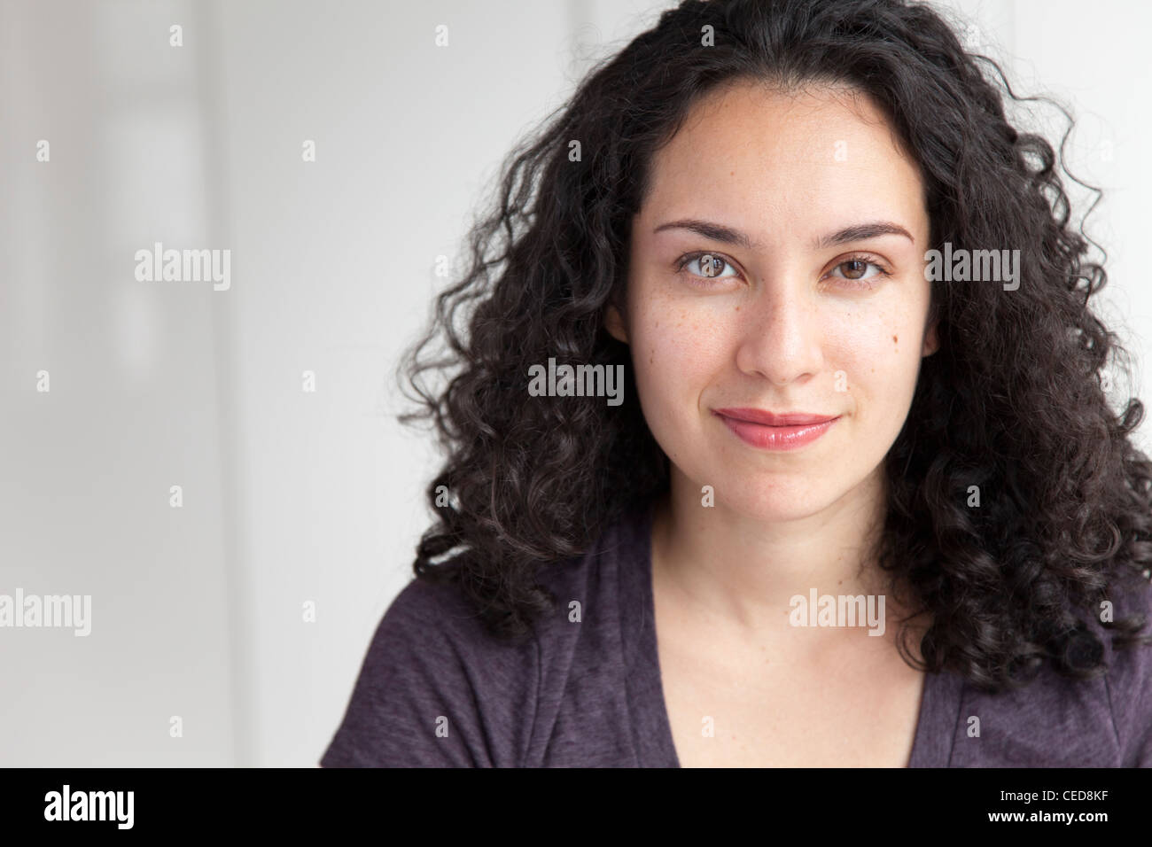 Smiling Hispanic woman Stock Photo - Alamy