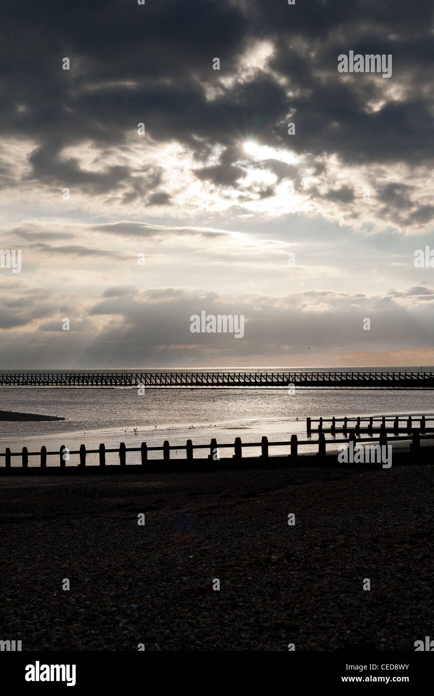 Littlehampton, Sussex - coast and beach with the sun shining on the sea ...