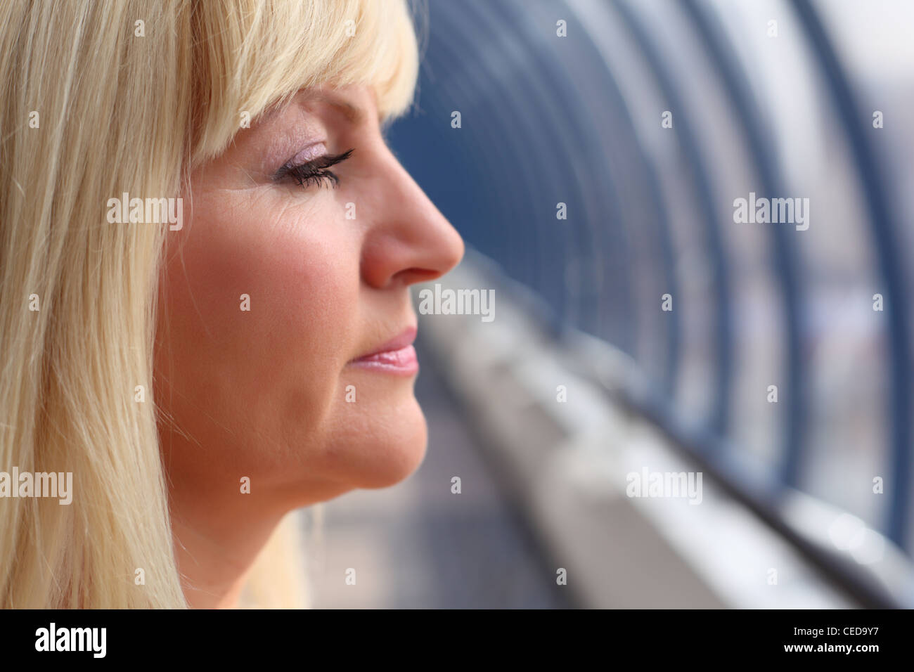 Profile of middleaged woman Stock Photo - Alamy