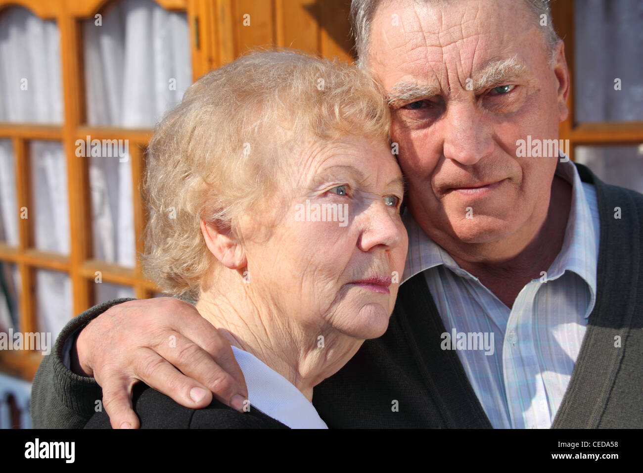 Portrait of serious thinking elderly couple closeup Stock Photo - Alamy