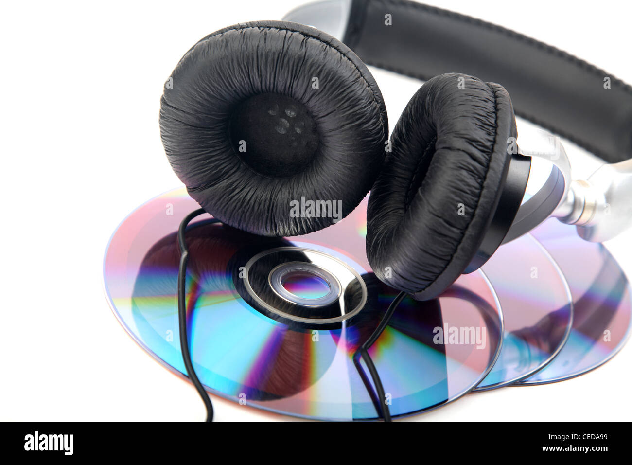 headphone and compact discs on a white background Stock Photo - Alamy
