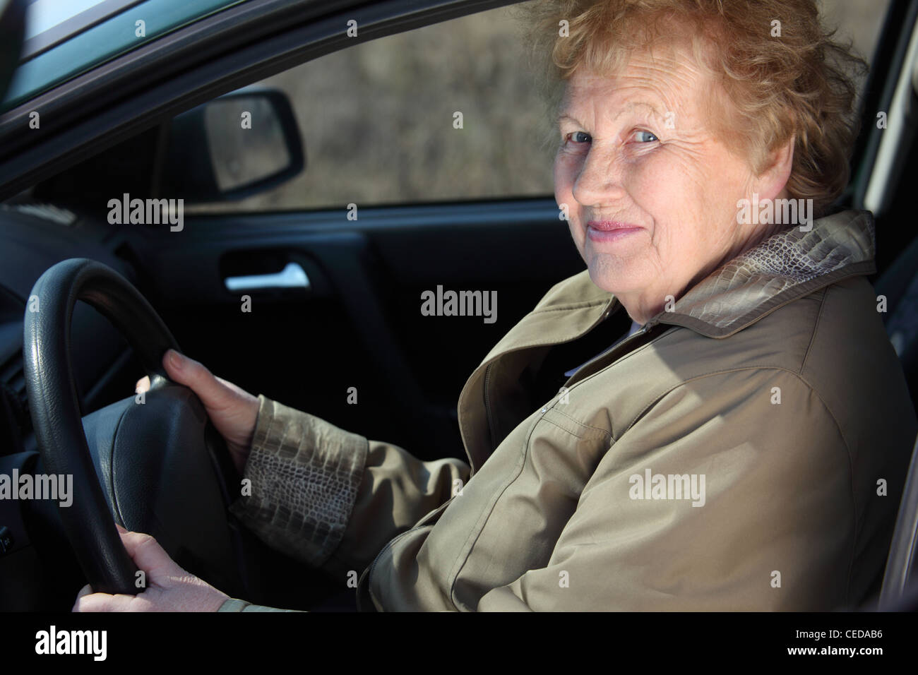Elderly woman driver steering wheel hi-res stock photography and images ...