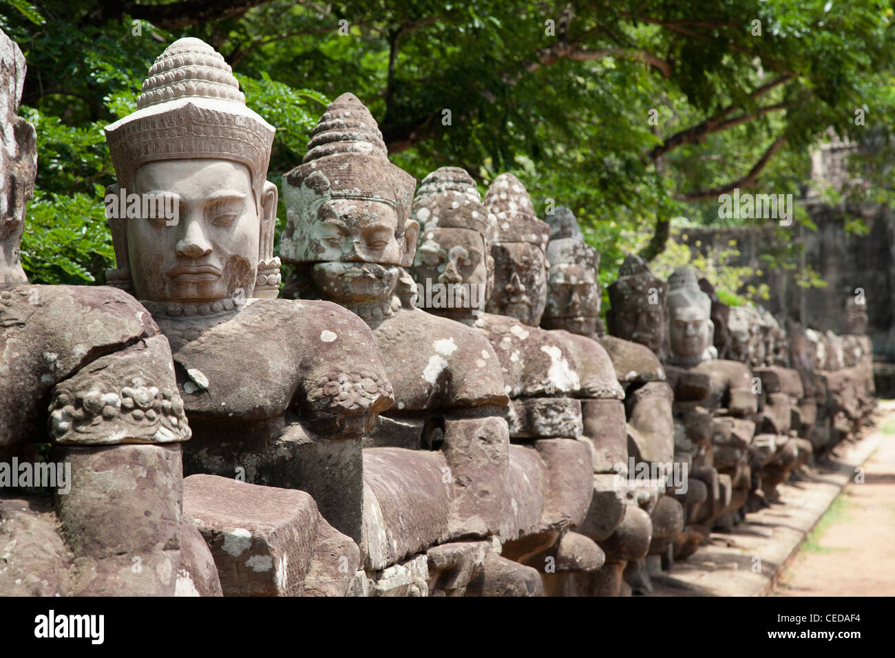 Statues in Angkor Thom temple Stock Photo - Alamy