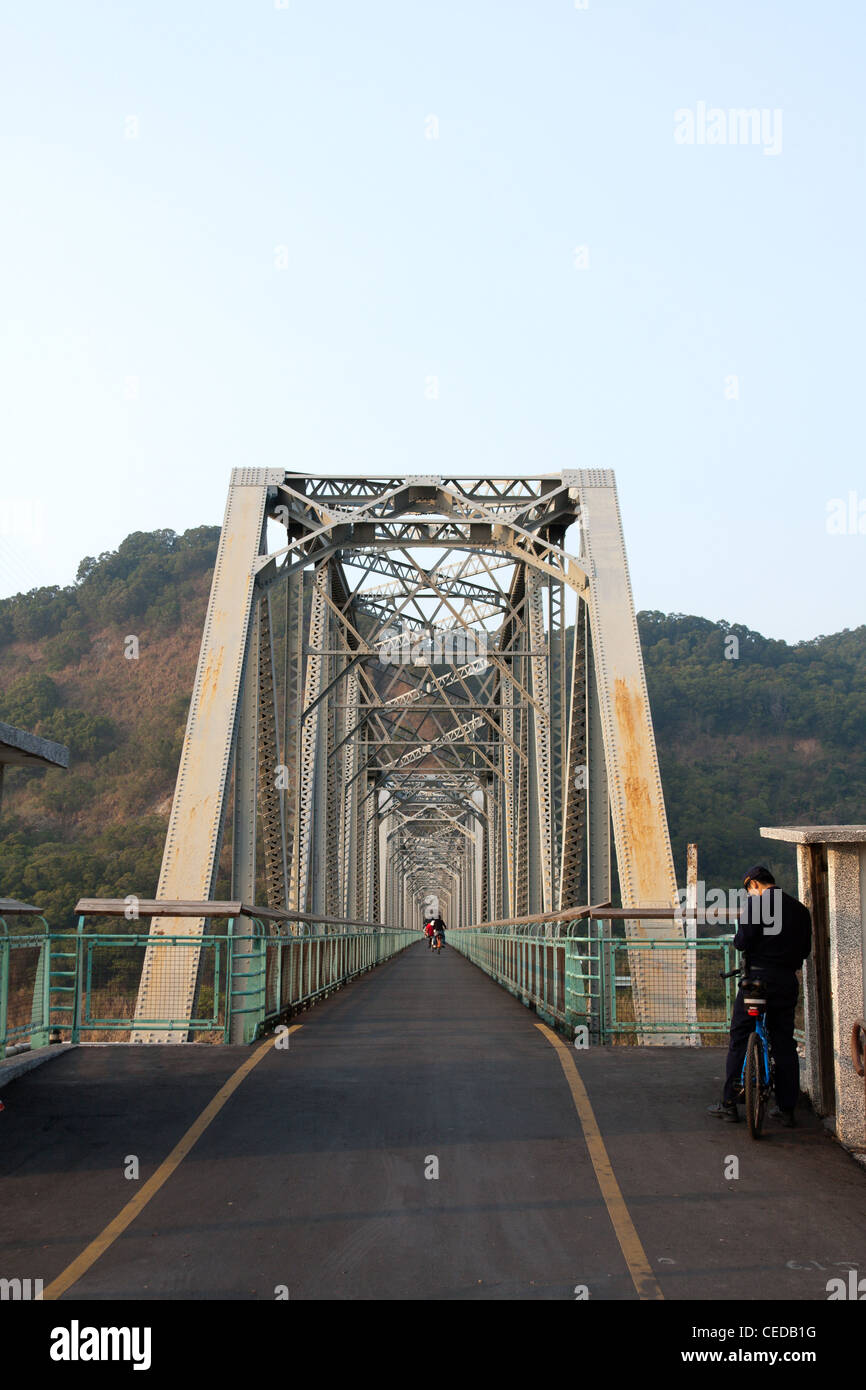Iron bridge bicycle path over Da-Jia Greek, between Fengyuan District ...
