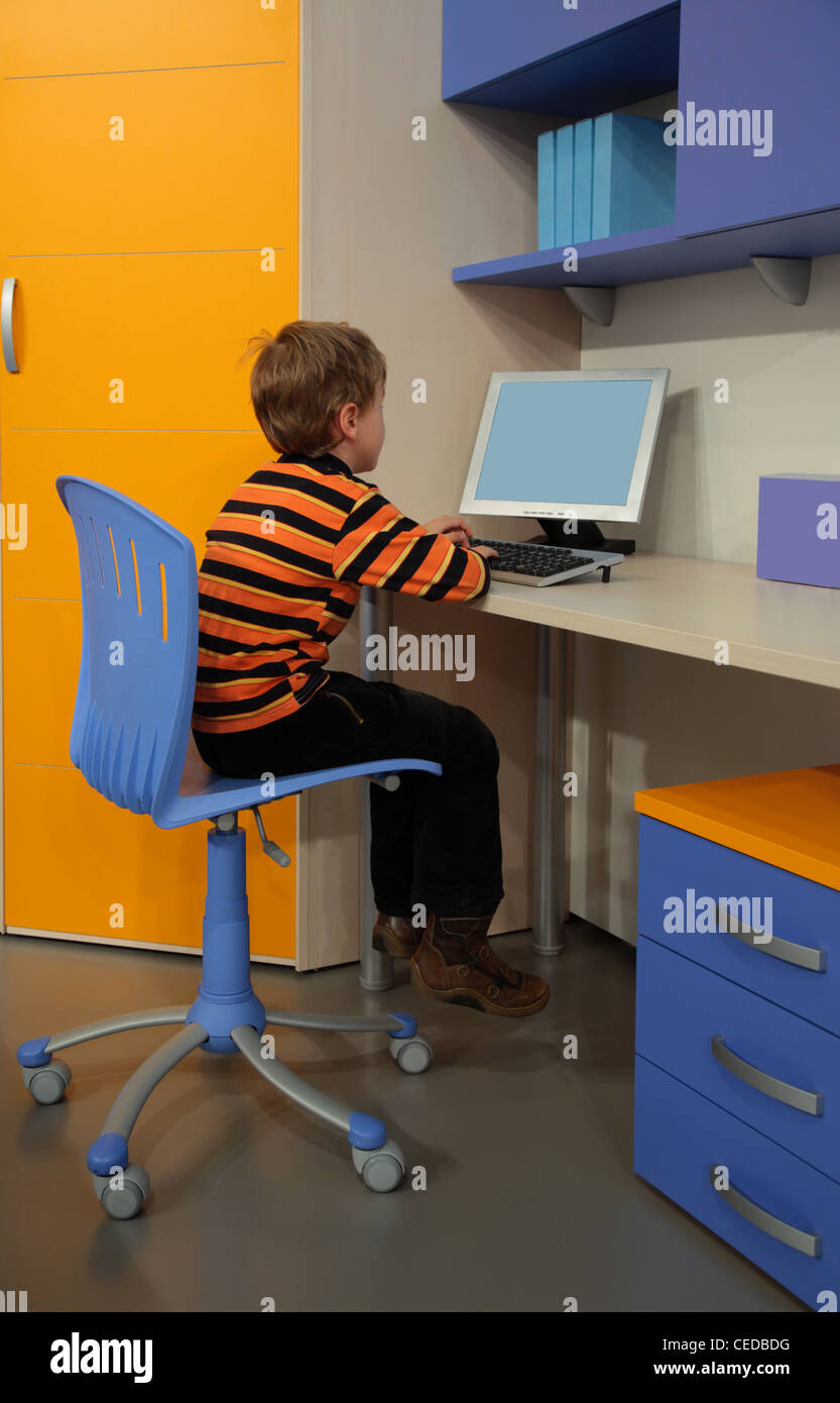 boy at computer in children's room Stock Photo - Alamy