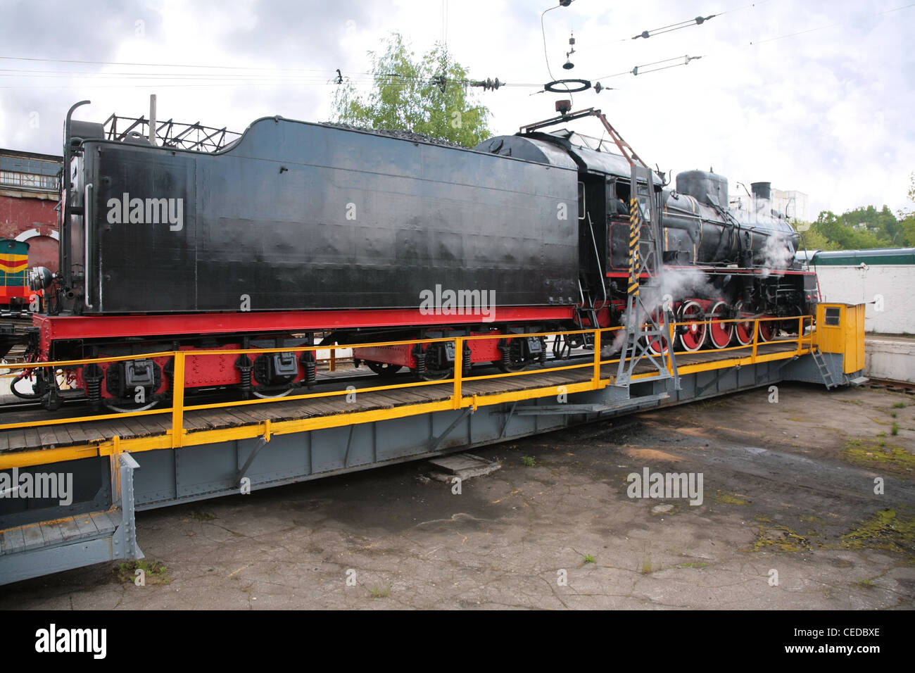 Steam locomotive on rotating table Stock Photo - Alamy