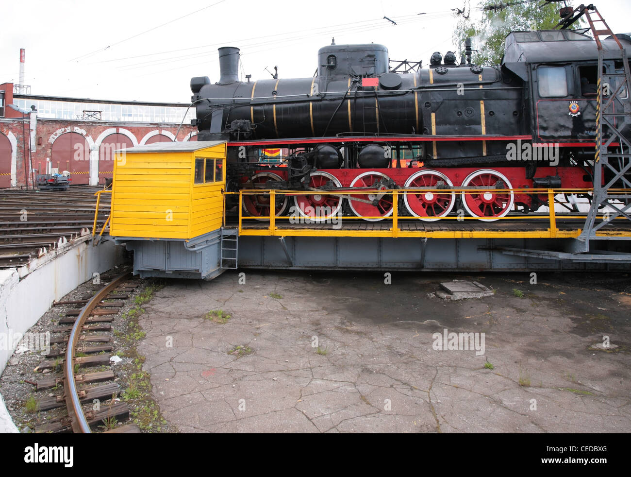 Steam locomotive in museum by side on turntable Stock Photo - Alamy